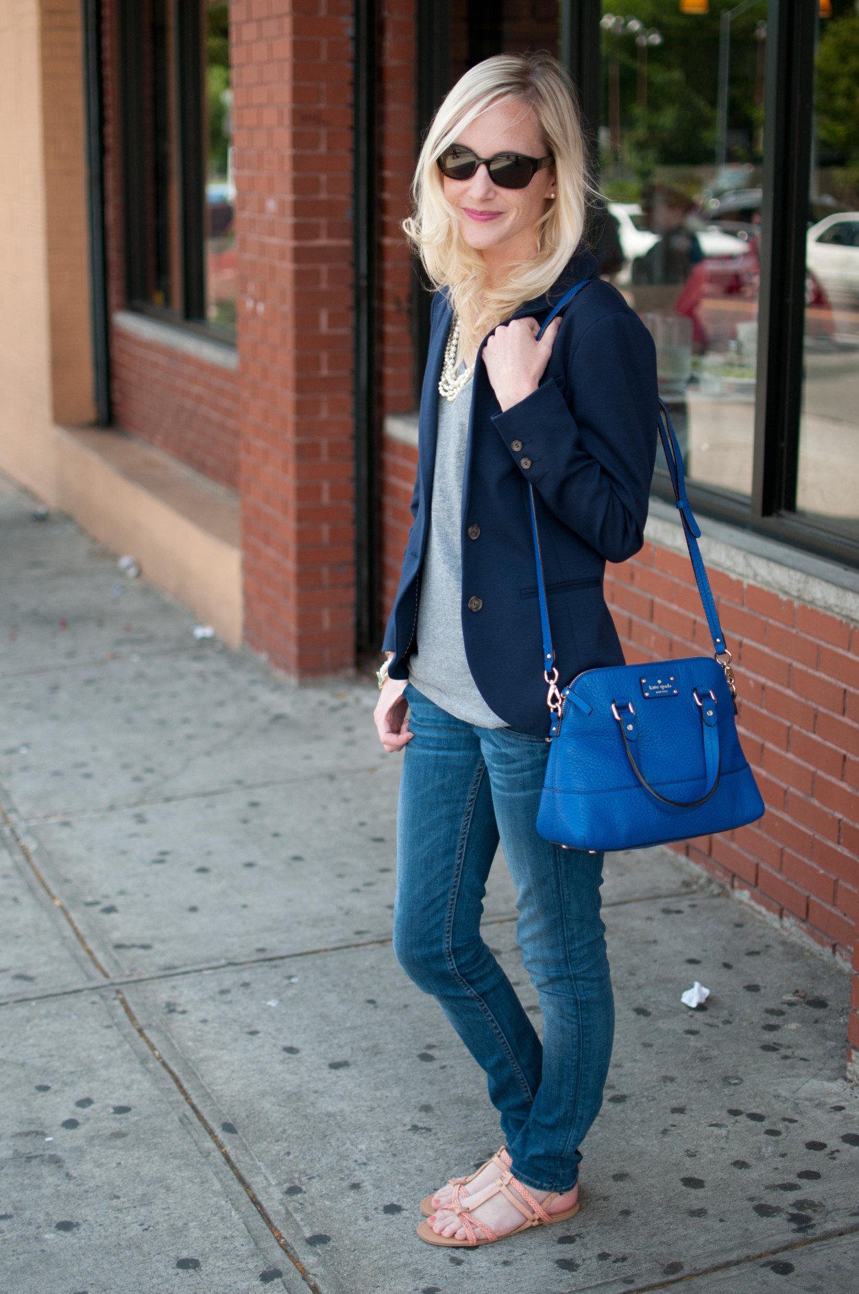 Casual Friday: Jeans, T-Shirts, and Bright Blue Bags